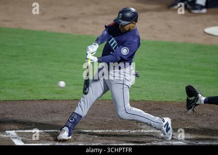 Seattle Mariners designated hitter Jorge Polanco reacts to hitting a ...
