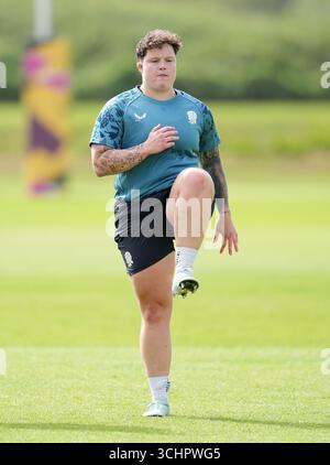 England's Hannah Botterman (right) during a team run at SGS College ...