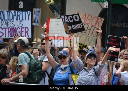 Workers over Billionaires Labor Day rally across from Trump Tower in ...