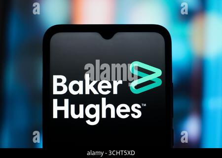 In this photo illustration, a Baker Hughes logo is seen displayed on a ...