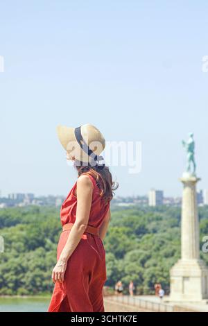 summer female solo trip to Europe, happy young woman walking on ...