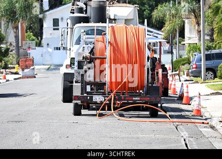 IRIVNE, CALIFORNIA - 09 SEPT 2025: Workers laying Fiber Optic Cable for ...