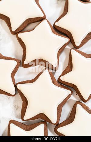 Perfectly Icing Star Cookies with Royal Icing Stock Photo - Alamy