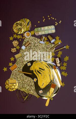 Gilding accessories in golden color. Gold plate art and gilding. During ...