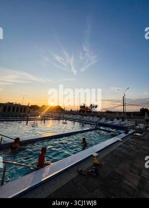 Solotvyno, Ukraine - June 30, 2025: A serene swimming pool surrounded ...