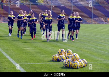 Soccer players jog during a training session, in Malabo, Equatorial ...