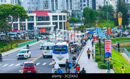 Da Lat, Vietnam - July 13rd, 2025: Street traffic in Da Lat city during ...