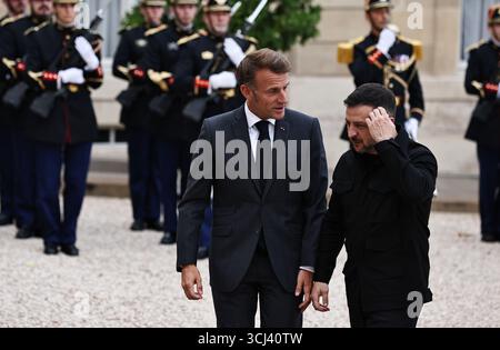 France s President Emmanuel Macron greets Emirati Minister of State for ...