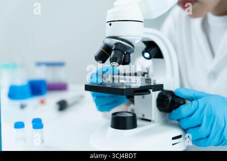 Scientist check chemical food residues in laboratory. Control experts ...