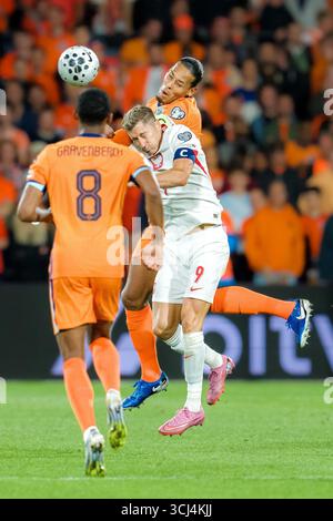 Robert Lewandowski of Poland and Virgil van Dijk of the Netherlands ...