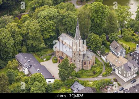 Aerial view, protestant town church and green trees on Schlossstrasse ...