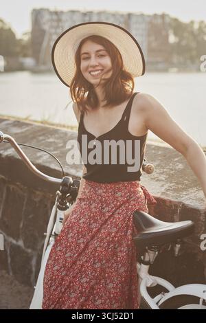 Caucasian young woman with cute adorable playful shy smile. Model white ...