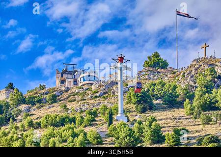 A cable car riding down the mountain on a foggy day in Jackson, Wyoming ...