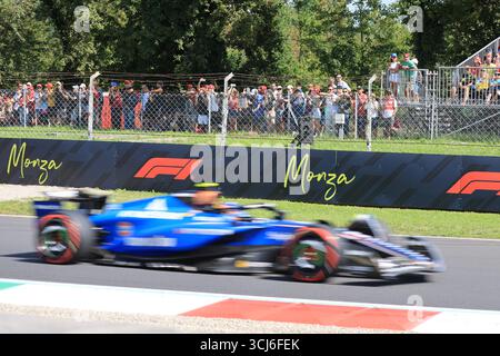 (L to R): Alexander Albon (THA) Atlassian Williams Racing walks the ...
