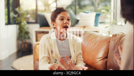 Disappointed strict parent mother talking on smartphone scolding child ...