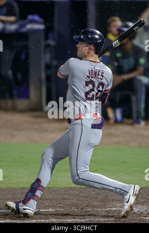 Cleveland Guardians center fielder Nolan Jones fields a ball hit by ...