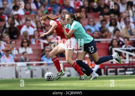 London City Lionesses' Isobel Goodwin (right) celebrates scoring their ...