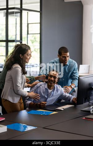Collaborating colleagues planning around office table, with sticky ...