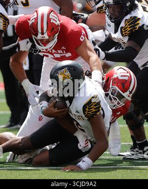 Kennesaw State quarterback Amari Odom (2) is tackled by Arkansas State ...