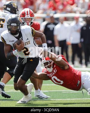 Kennesaw State quarterback Amari Odom (2) is tackled by Arkansas State ...