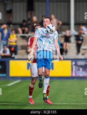 Barrow's Lewis Shipley in action with Crewe's Conor Thomas during the ...