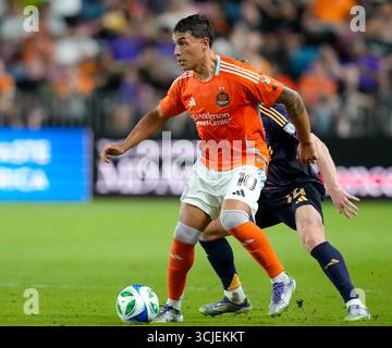 Houston Dynamo forward Ezequiel Ponce, left, and CF Montreal defender ...