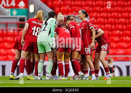 Liverpool's players in a huddle before the Premier League match between ...