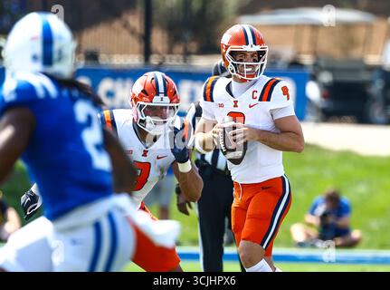 Illinois quarterback Luke Altmyer looks to pass the ball during the ...