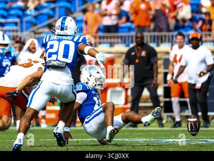 Illinois defensive back Tanner Heckel (16) tackles Ohio State tight end ...