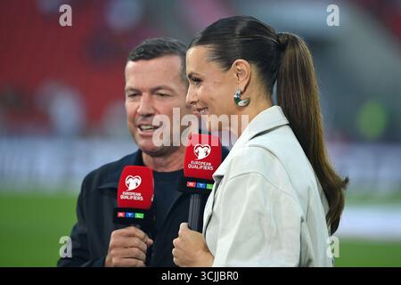 Cologne, Germany, September 7th 2025 A 1.FC Koln logo on a Germany flag ...