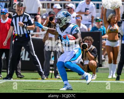 Carolina Panthers running back Trevor Etienne (23) is tackled by New ...