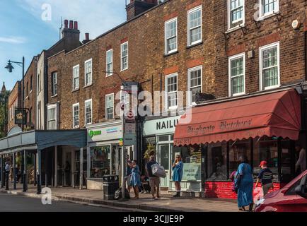 Row of shops on Highgate High Street, London, England, UK Stock Photo ...