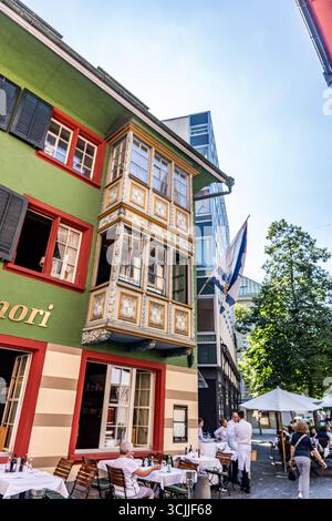 Picturesque view of Augustinergasse in Zurich with colorful medieval ...