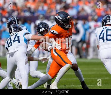 Denver Broncos linebacker Nik Bonitto (15) runs for a touchdown against ...