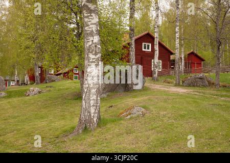 Hedemora, Sweden – MAY 10, 2025: Red, well-kept buildings at Dala-Husby ...