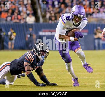 Chicago Bears safety Jaquan Brisker (9) runs onto the field prior to an ...