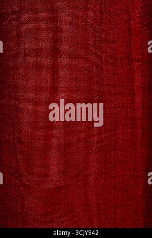 red textile pattern background with backlit light Stock Photo - Alamy