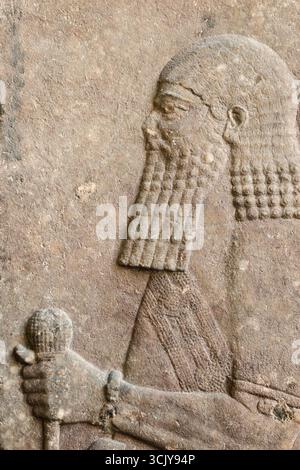 fragment of stone wall relief from ancient Assyria Stock Photo - Alamy