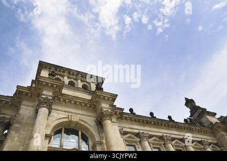 Side view to Berlin Reichstag with cloudy sky background Stock Photo ...
