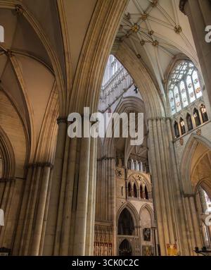 Gothic interior of York Minster with ribbed vaults, pointed arches, and ...