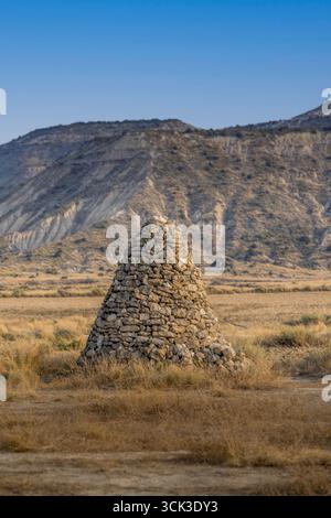 Stone Cairn Landmark In Bardenas Reales Semi-Desert Landscape Navarre ...