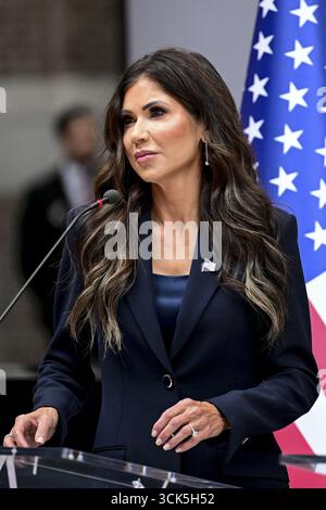 Secretary of Homeland Security Kristi Noem is seen in a motorcade after ...