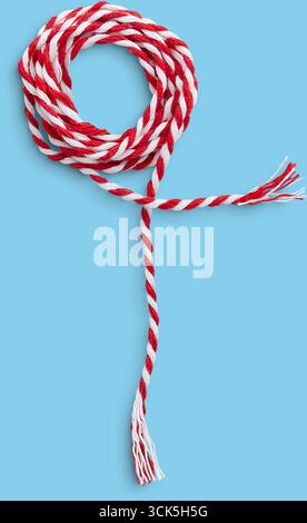 Red and white Christmas decoration, possibly handmade, with the word ...