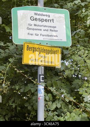 Forest path with prohibition sign Stock Photo - Alamy