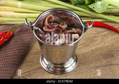 Grilled octopus red tentacle sliced appetizer Stock Photo - Alamy