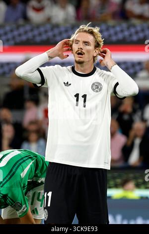 Nick Woltemade (Deutschland) im Zweikampf mit Seid Korac (Luxemburg ...