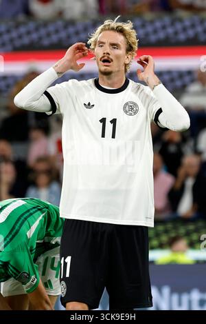 Nick Woltemade (Deutschland) im Zweikampf mit Seid Korac (Luxemburg ...