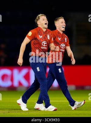 South Africa's Dewald Brevis, left, bowled out by India's Harshit Rana ...
