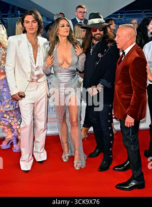Damian Hurley, Elizabeth Hurley and Billy Ray Cyrus attend the NTA's ...