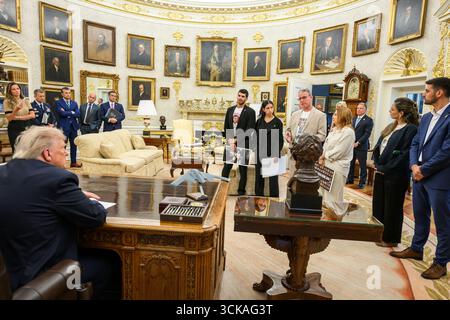 Freed Israeli hostage Evyatar David gestures from a van as he arrives ...